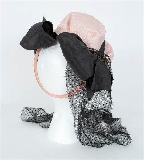 Light Pink Miniature Tilted Top Hat With Trailing Black Veil O S