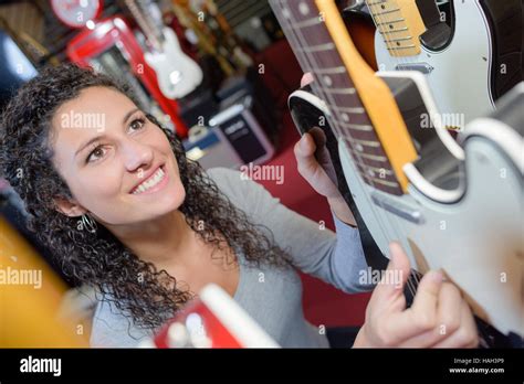 Testing The Guitar Strings Stock Photo Alamy
