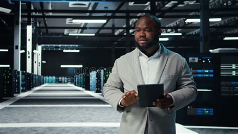 Data Center Engineer Monitoring Servers Performing Ai Training Stock Footage Video Of Tablet