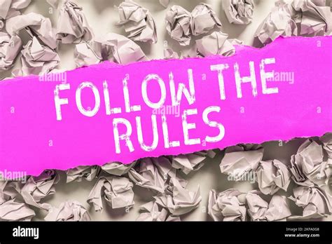 Text Sign Showing Follow The Rules Word Written On Learn To Conform