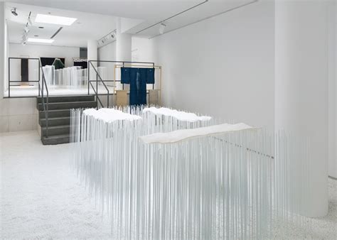 Hemp Textiles Are Laid Across Metal Rods In Japanese Exhibition