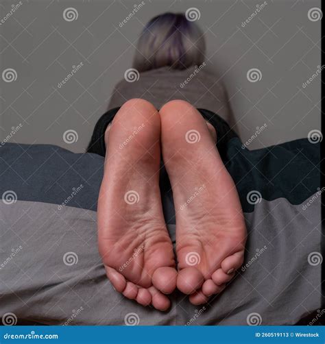 Closeup Of The Soles Of Female Feet Lying In A Bed Stock Image Image Of Healthy Woman