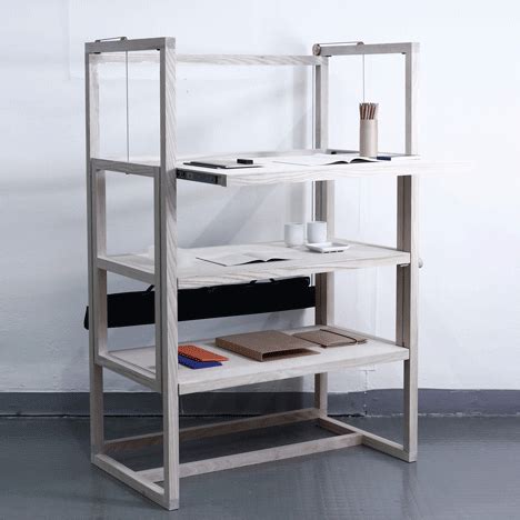 A Shelf Of Tables Is Three Desks In One Shelf