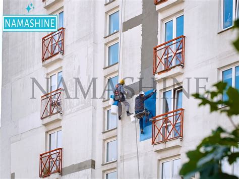 نقاشی نمای سیمانی ساختمان به روش دسترسی با طناب