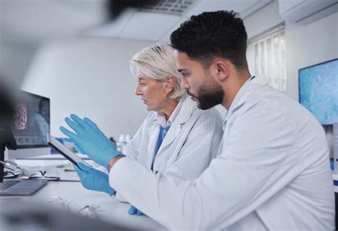 Teamwork Collaboration Or Laboratory Tablet In Science Research Dna