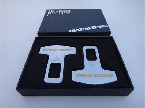 Заглушки в ремни безопасности Mazdaspeed — Mazda 3 MPS (1G), 2,3 л ...