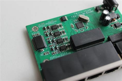 Premium Photo Main Network Switch Circuit Board With Four Soldered Controllers For Network