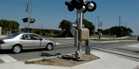 railroad crossing signals flashing