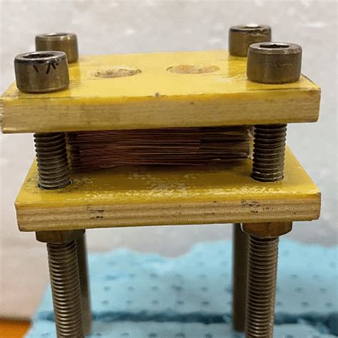 Magnetic Flux Density In Small Hole Center Of A Bitter Like Hts Magnet