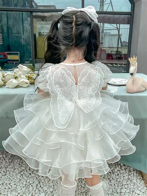 لباس مجلسی عروسکی سفید بچگانه دخترانه برای عروسی و جشن تولد