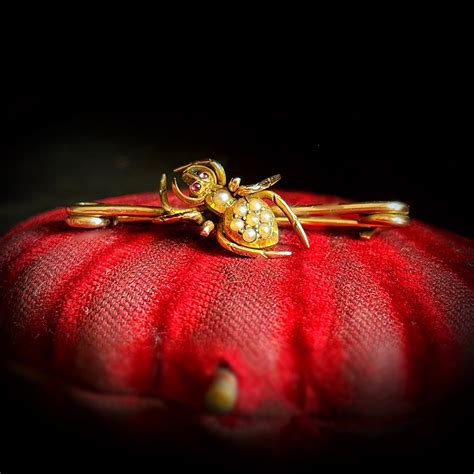 Victorian Spider Ruby And Pearl Brooch In 9 Carat Rose Gold Circa 1890