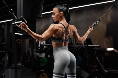 Fitness Woman Doing Exercise For Glutes Cable Kickbacks Athletic Girl