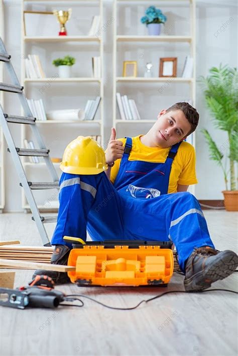 Young Man Assembling Wood Pallet Photo Background And Picture For Free