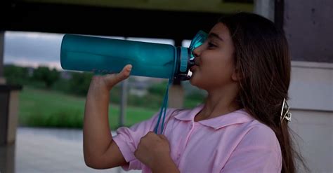 Girl Drinking From A Water Bottle Free Stock Video Footage Royalty
