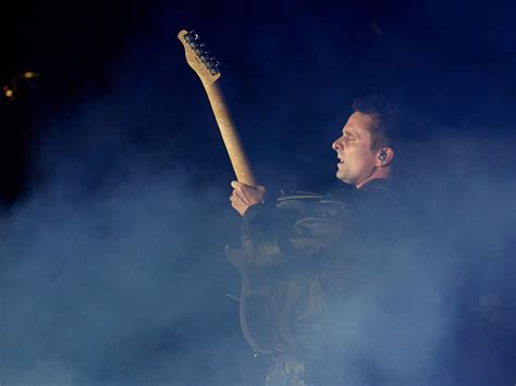Matt Bellamy Smashes Guitar And Ts It To A Fan During Muse Gig