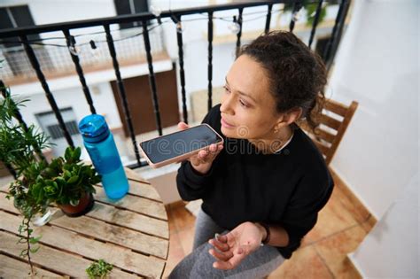 Woman Using Voice Assistant On Smartphone Outdoors On Balcony Stock Image Image Of Social