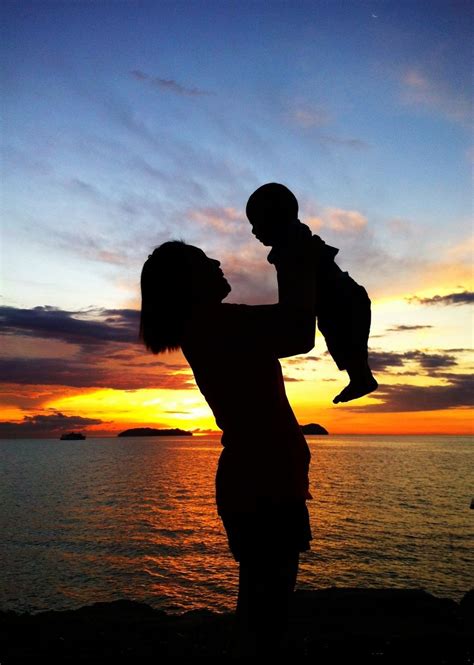 Mother And Son Enjoying Sunset By The Beach Smithsonian Photo Contest