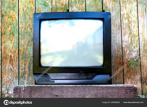 Old Analog Television Set Weathered Wooden Planks Background — Stock