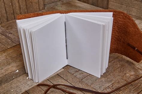 Premium Photo Blank Leather Notebook On Wooden Table Artisan Craft Detail