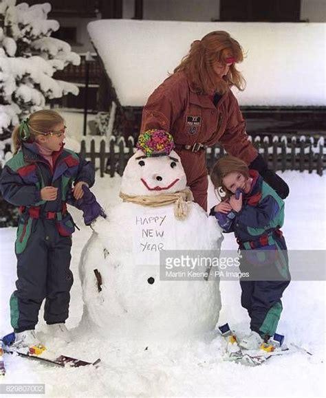 Princess Beatrice Plays Beside Sam The Snowman Outside The Chalet In