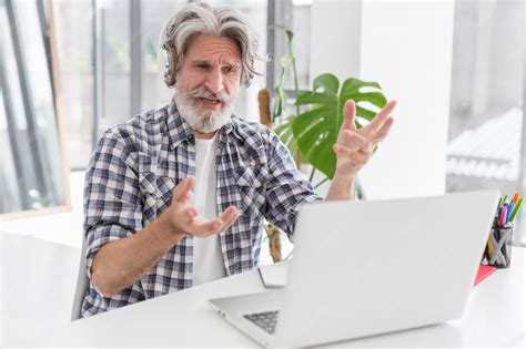 Free Photo Teacher At Desk Talking To Laptop