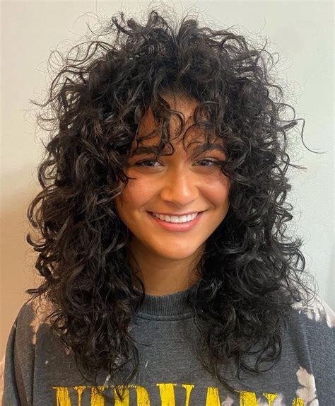30 Wolf Cuts For Curly Hair To Sport In 2025