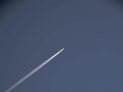 Fast Moving Object Captured While Photographing Passenger Plane By