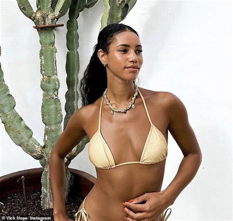 Vick Hope Shows Off Her Incredible Figure In A Shimmering Gold Bikini