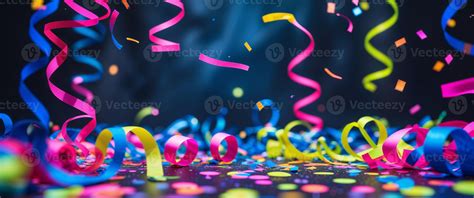Colorful Party Streamers And Confetti On A Dark Background 65697326