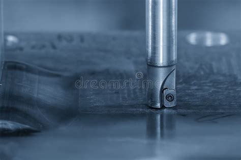 The Cnc Milling Machine Rough Cutting The Injection Mold Parts By Indexable Tools Stock Image