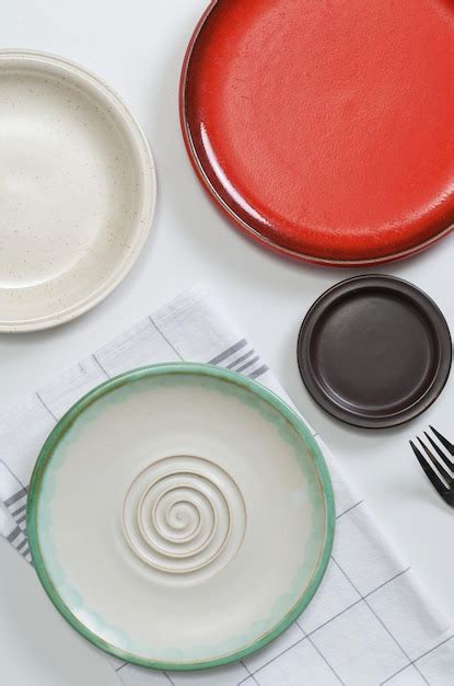 Premium Photo Different Plates On Table