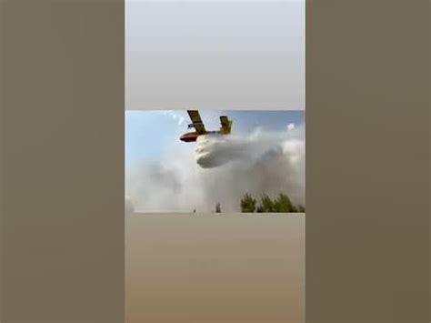 Air Tanker Drops Water On San Augustine County Wildfire Youtube