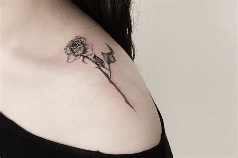 Rose Outline With Stem Tattoo