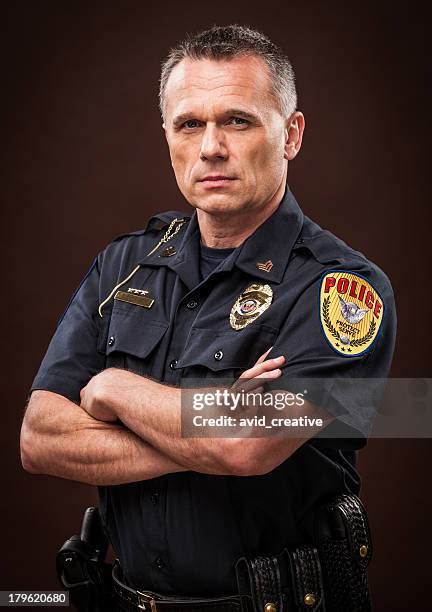 Police Officer Uniform Photos And Premium High Res Pictures Getty Images