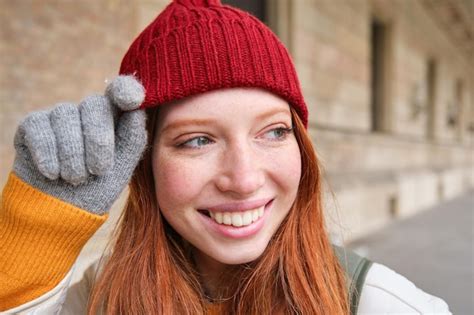 Free Photo Headshot Of Happy Redhead Girl With Freckles Wears Red Hat