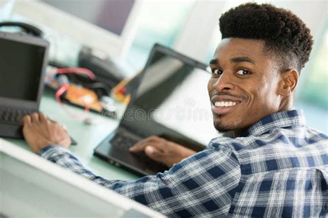Portrait Male Computer Engineer Using Two Laptops Stock Image Image Portrait Male Computer Engineer Using Two Laptops Stock Image Image