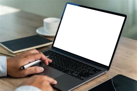 Premium Photo Male Hands And A Laptop With A Blank Screen In A Cafe