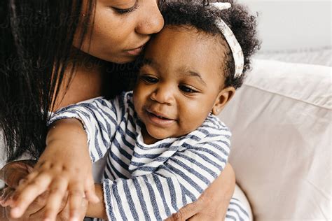 A Mother And Daughter Showing Affection And Love By Stocksy