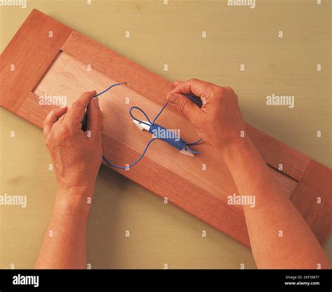 Forming A Wire Loop Stock Photo Alamy