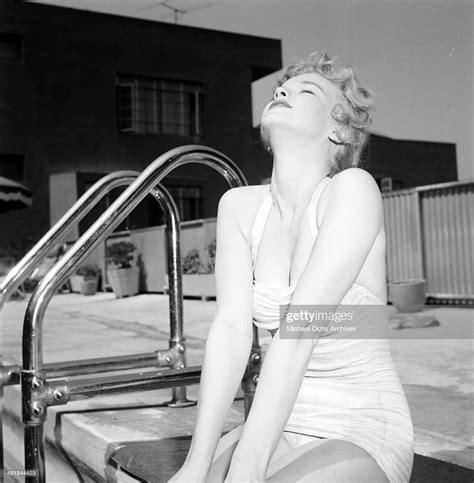 Actress Anne Francis Poses By The Swimming Pool In Los Angeles News