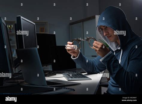Hacker Hacking Computer At Night Stock Photo Alamy