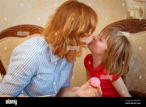 Mom And Daughter Have Fun Painting Eggs For Easter We Paint Eggs In Bright Colors Mother