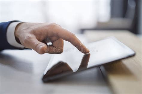 Focused View Of A Male Hand Interacting With A Modern Tablet Device Stock Image Image Of