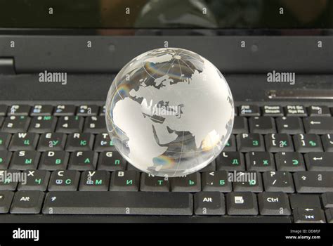 Globe On Laptop Stock Photo Alamy