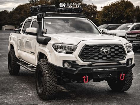 2019 Toyota Tacoma With 16x8 12 Pro Comp 69 And 255 85r16 Falken