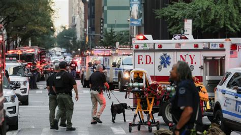 Nypd Officer Blackstone Executive Among Midtown Manhattan Shooting
