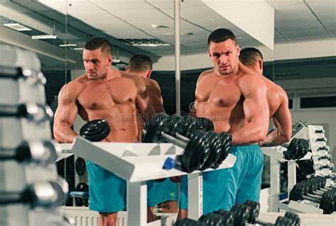Dumbbells Gym Workout Athletic Body Sportsman Training Sporty Male With Naked Torso Stock