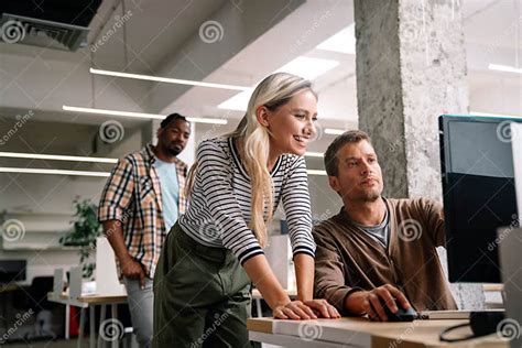 software engineers working on project and programming in company