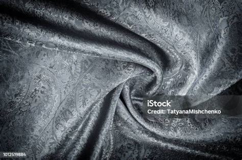 배경 질감 패턴입니다 그레이 페이 즐 리 실크 자 카드 직물에 짠 색조 디자인 복잡 하 게 짠된 반짝 직물 이다 직조 그림자 패턴의 효과 생성 하거나 인쇄 합니다 0명에