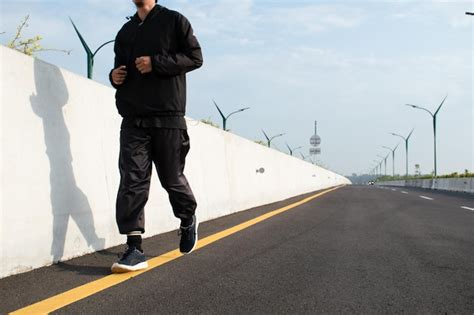 Premium Photo Man Runner Feet Running On Road Jogging At Outdoors Man Running For Exercise